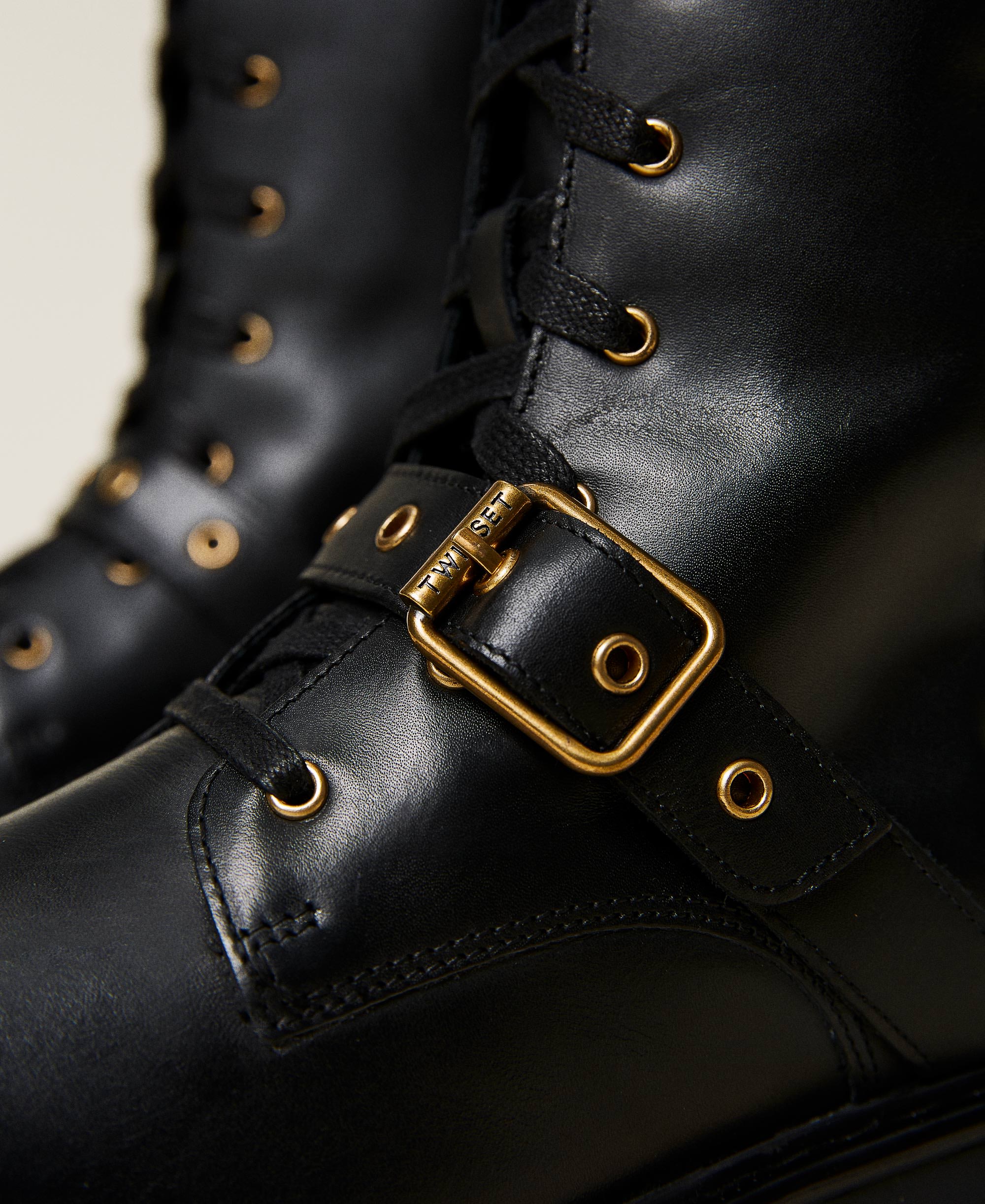 Leather combat boots with decorative eyelets Woman, Black | TWINSET Milano
